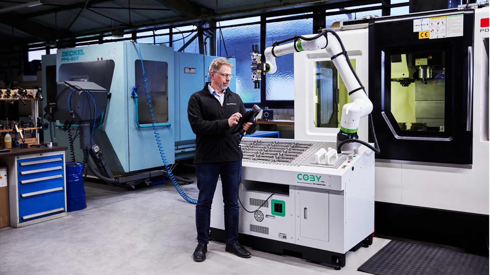 Robot solution for machine loading and unloading – All About Automation